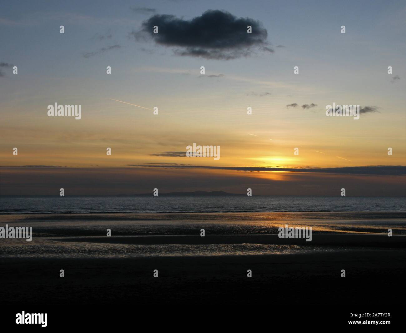 Sunset over the Isle of Man from Seascale, Cumbria, England, United ...