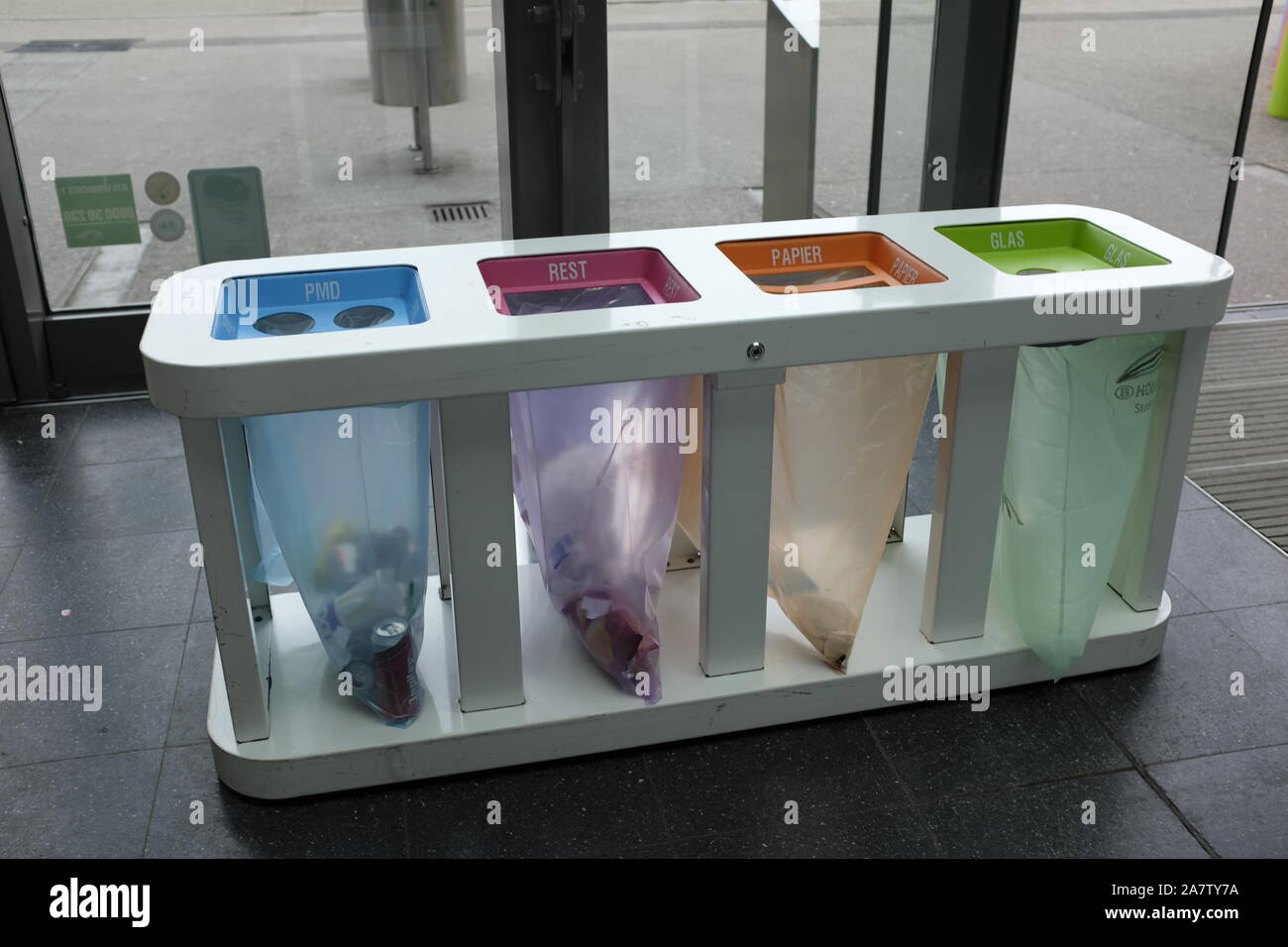 recycle bin in a belgium train station Stock Photo - Alamy