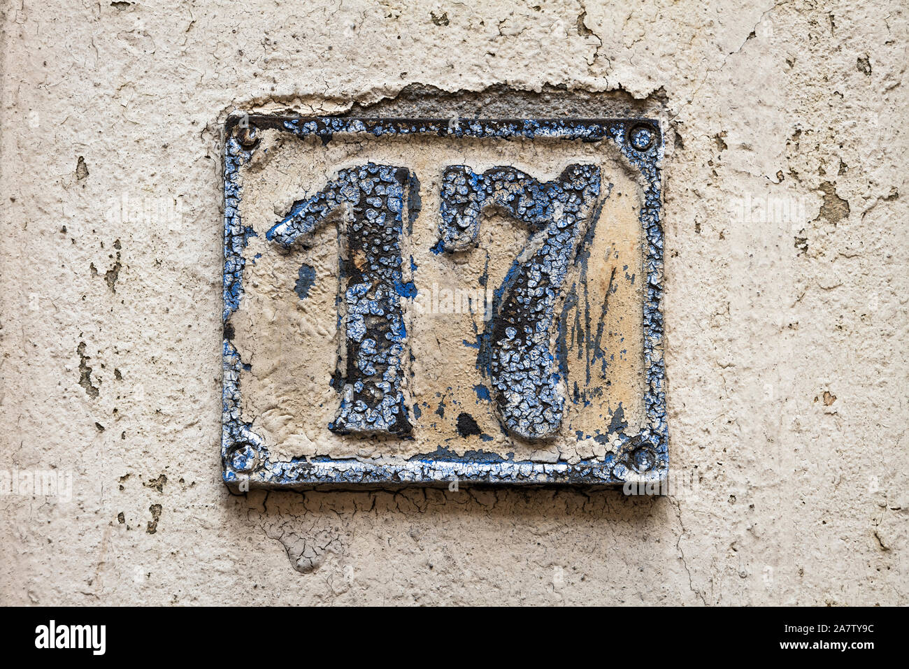 Street number sign on the wall Stock Photo - Alamy