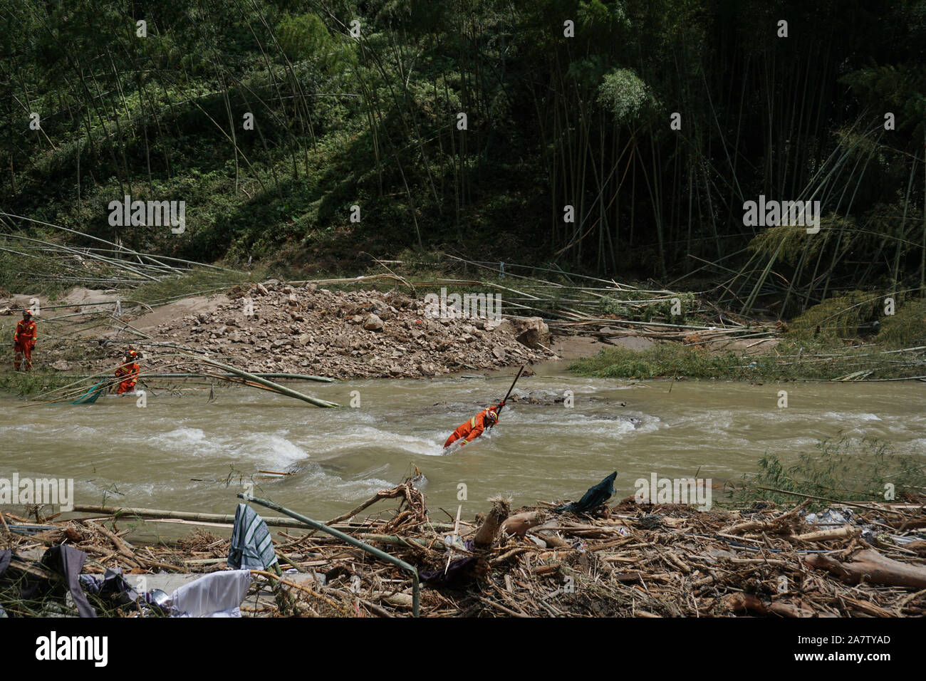 Rescuers conduct rescue operation in landslide area caused by Typhoon ...