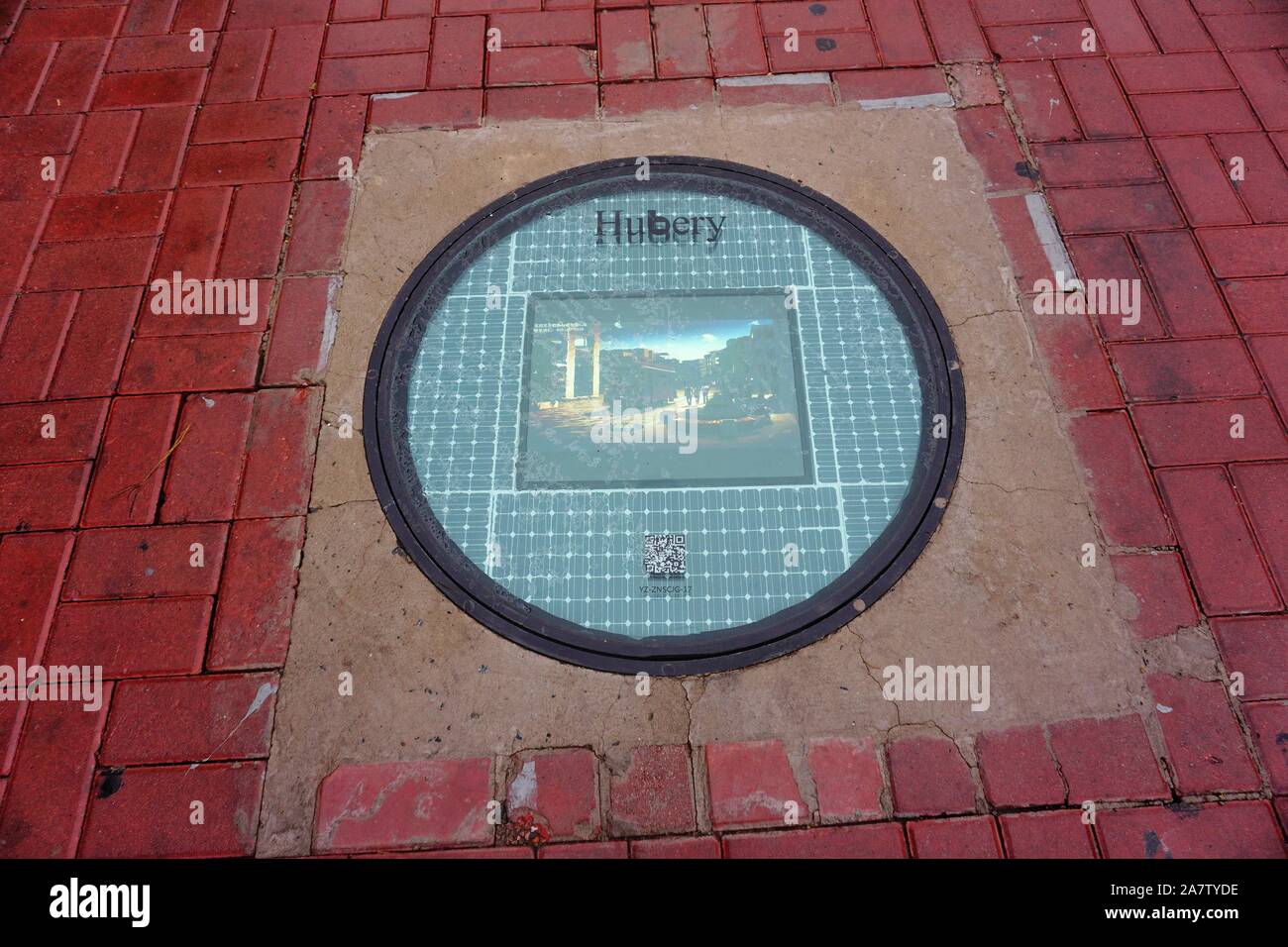 A smart well lid appears and attract attention of pedestrian at West ...