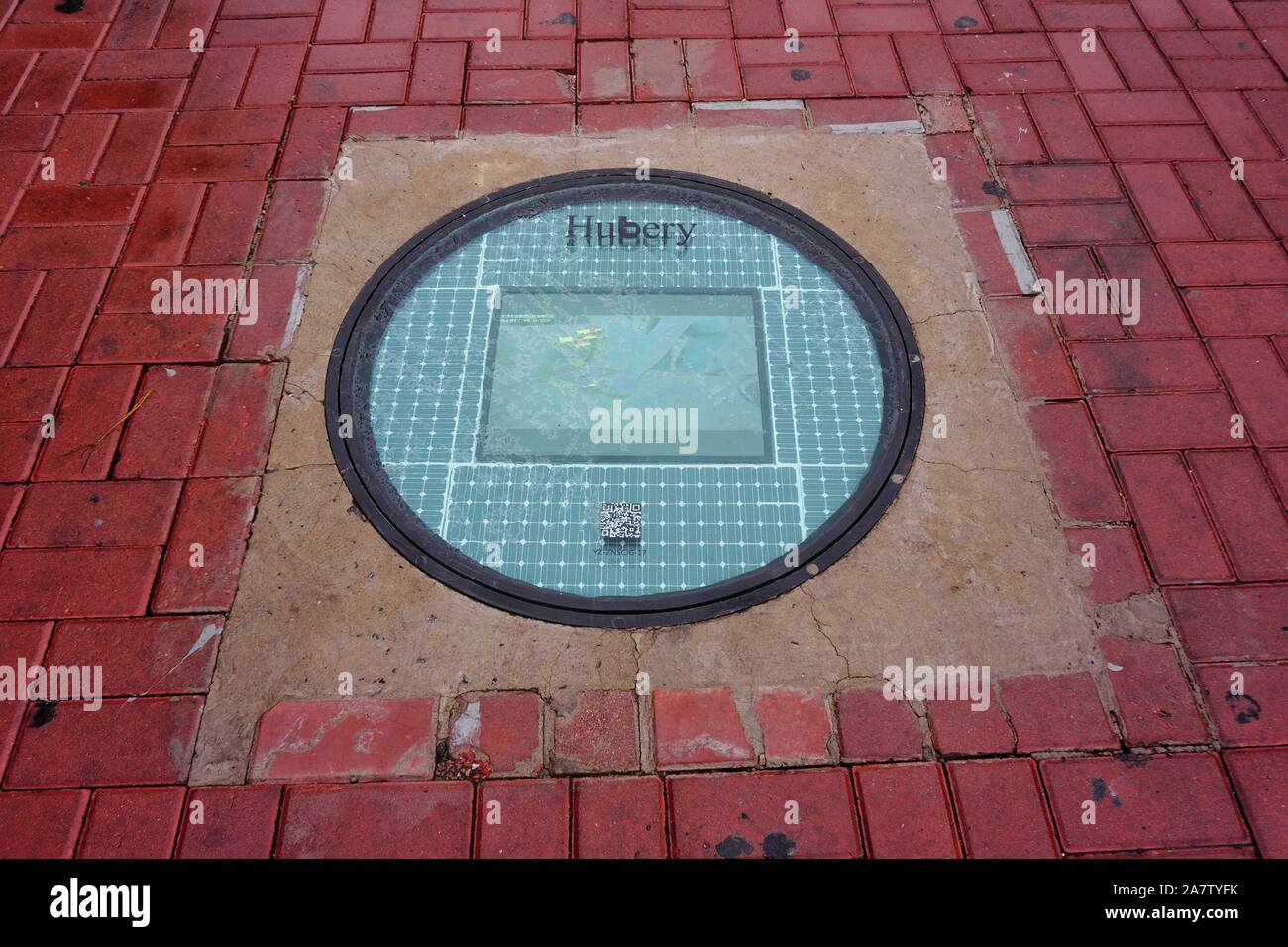A smart well lid appears and attract attention of pedestrian at West ...