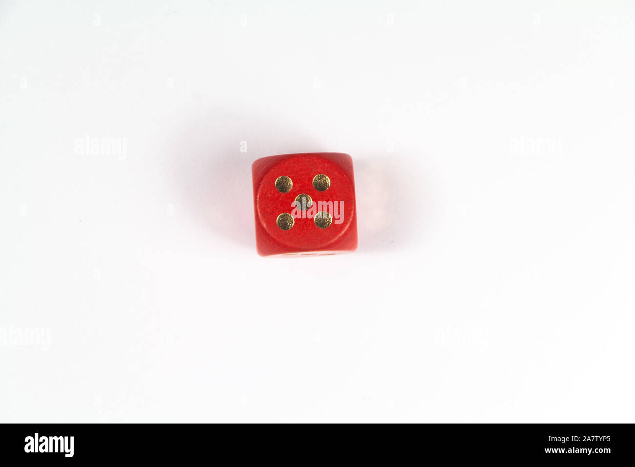 Red dice stopped on the number five on white background Stock Photo - Alamy