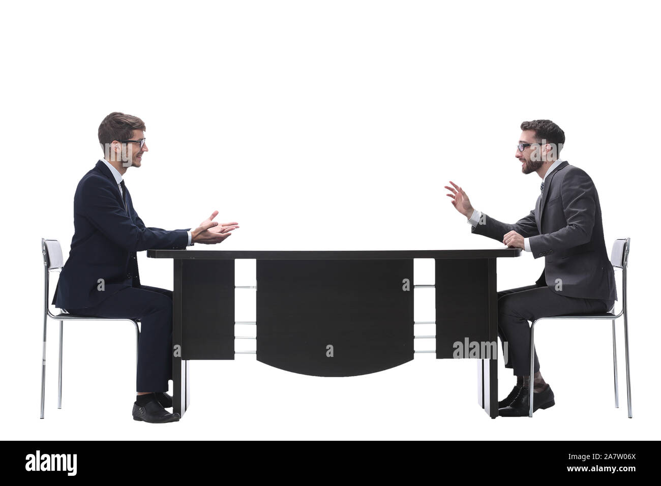 Two colleagues sitting table Cut Out Stock Images & Pictures - Alamy