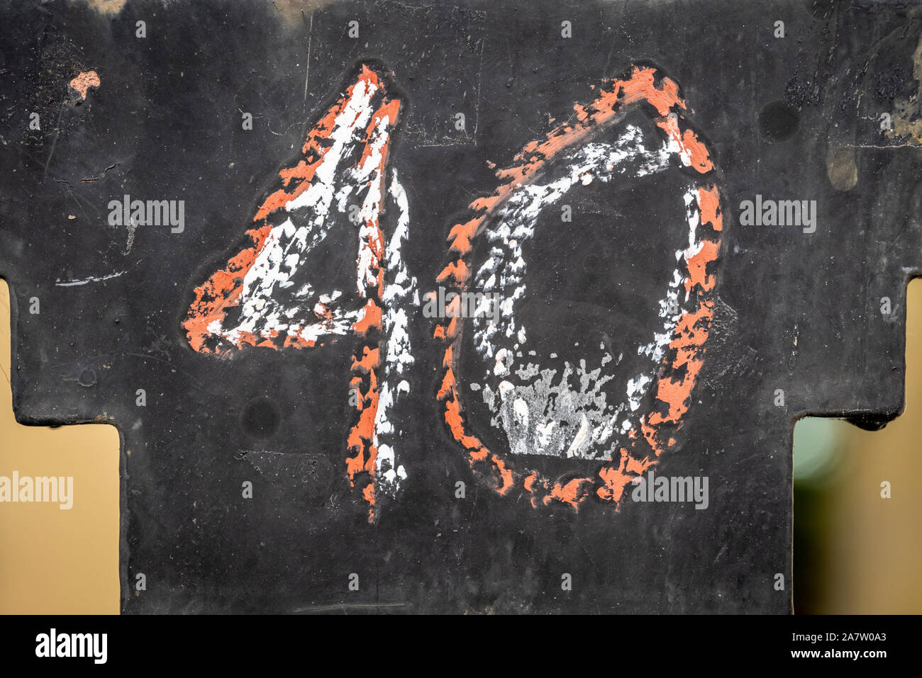 Street number sign on the wall Stock Photo - Alamy