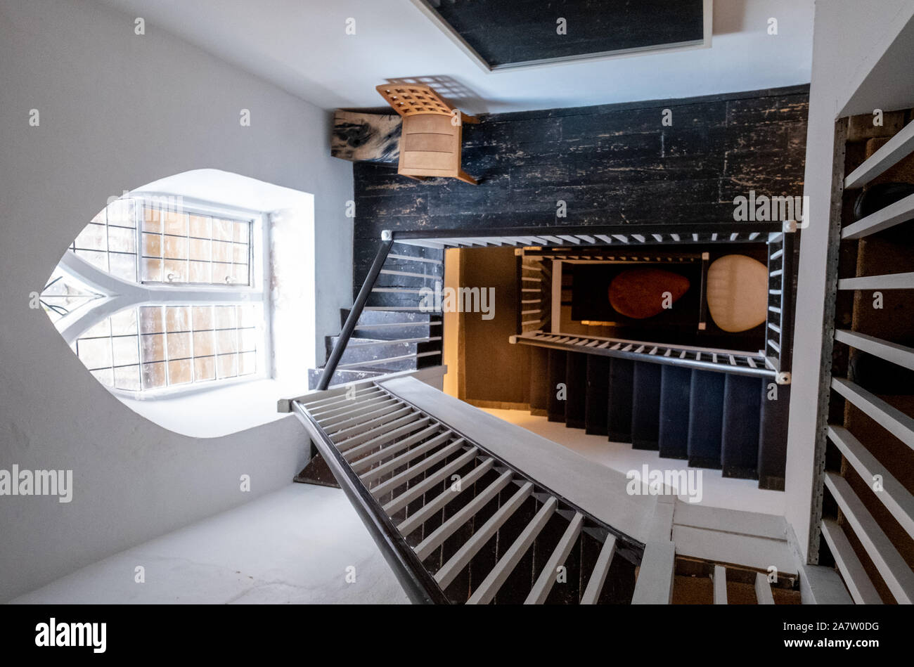 Interior dark wood staircase and gothic window at At The Chapel ...
