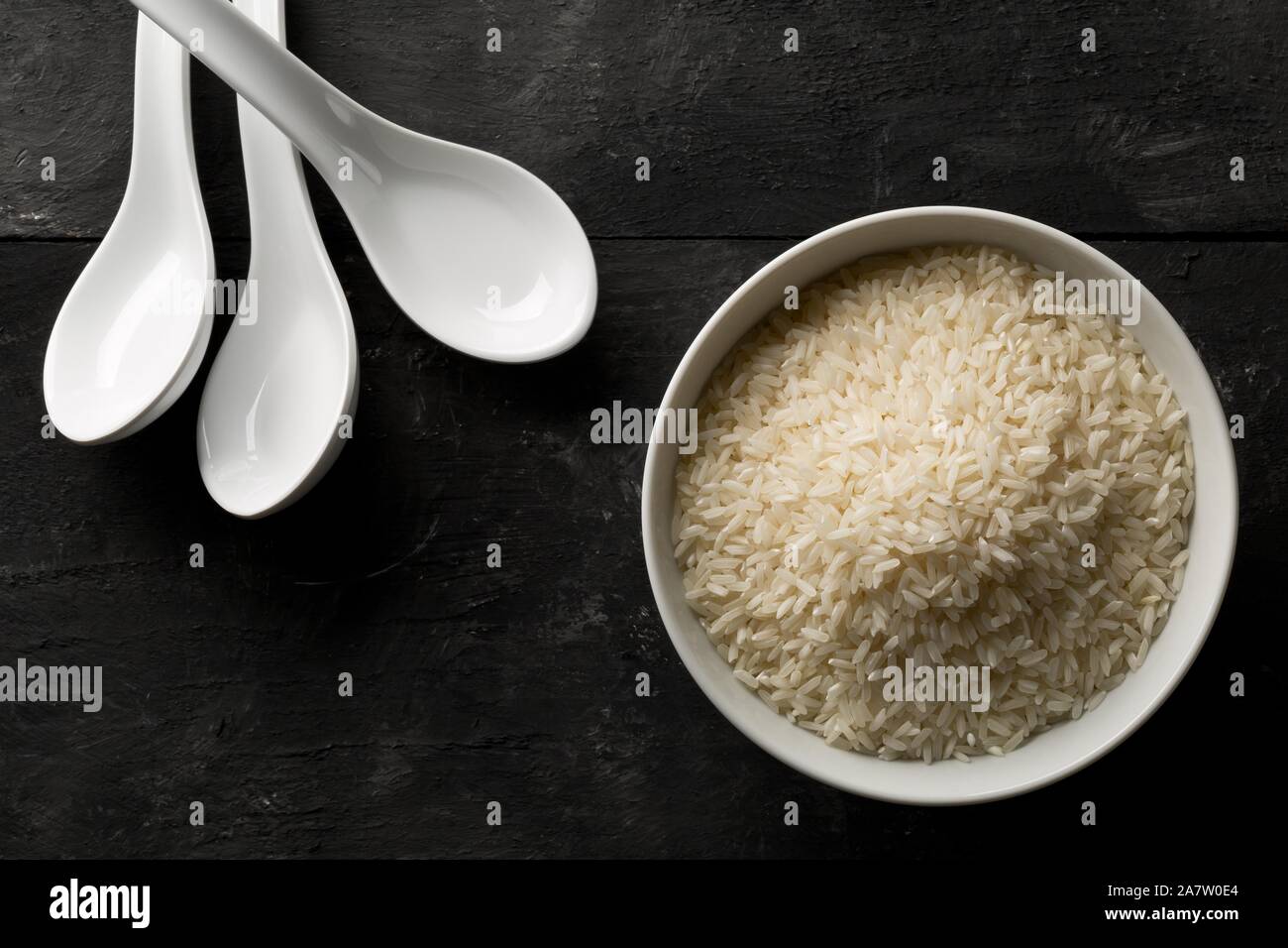 Rice with spoons hi-res stock photography and images - Alamy