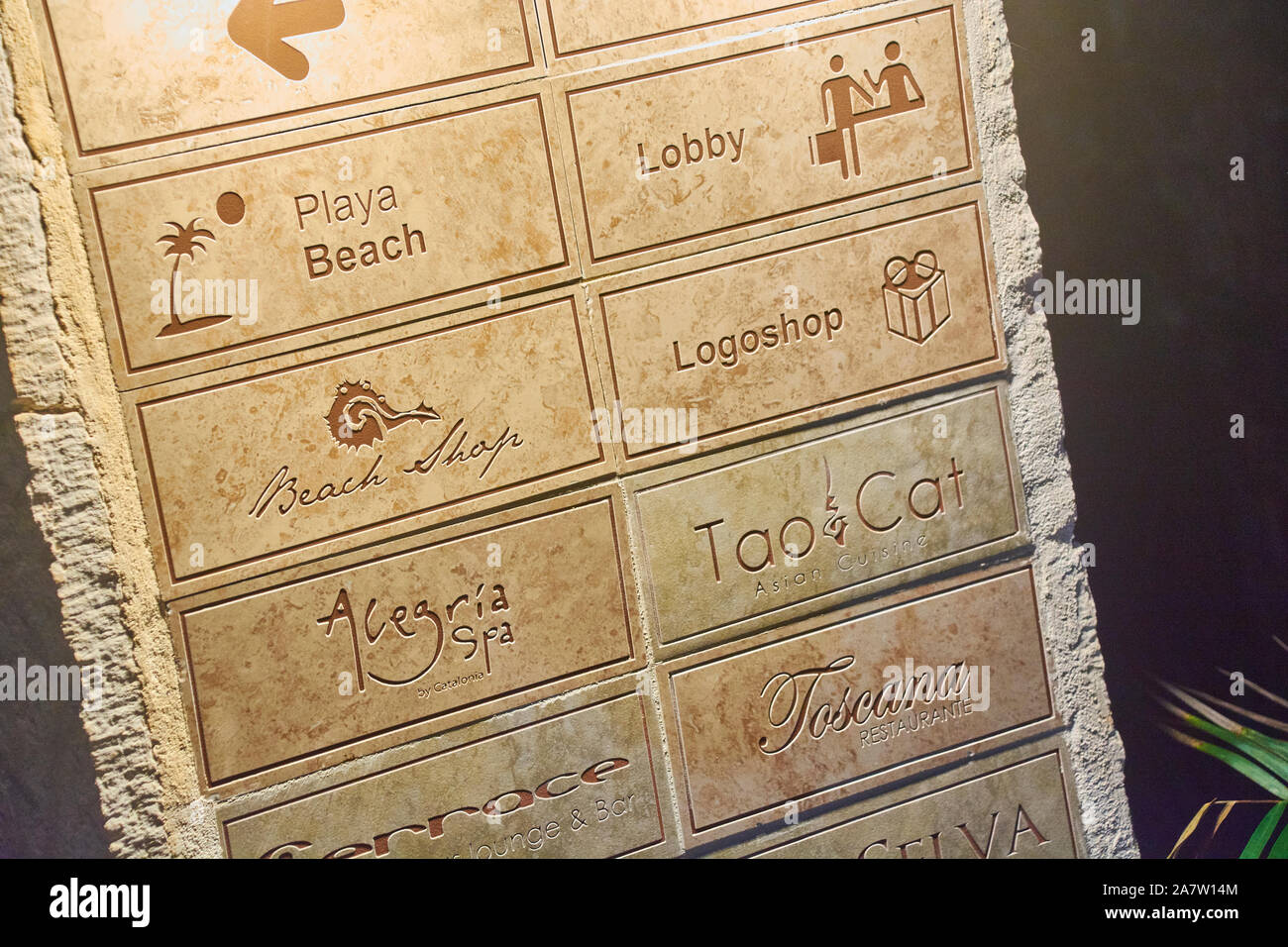 Marble sign indicating the various places Stock Photo - Alamy