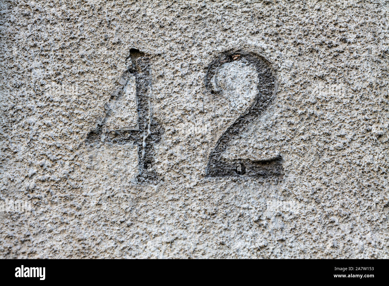Street number sign on the wall Stock Photo - Alamy