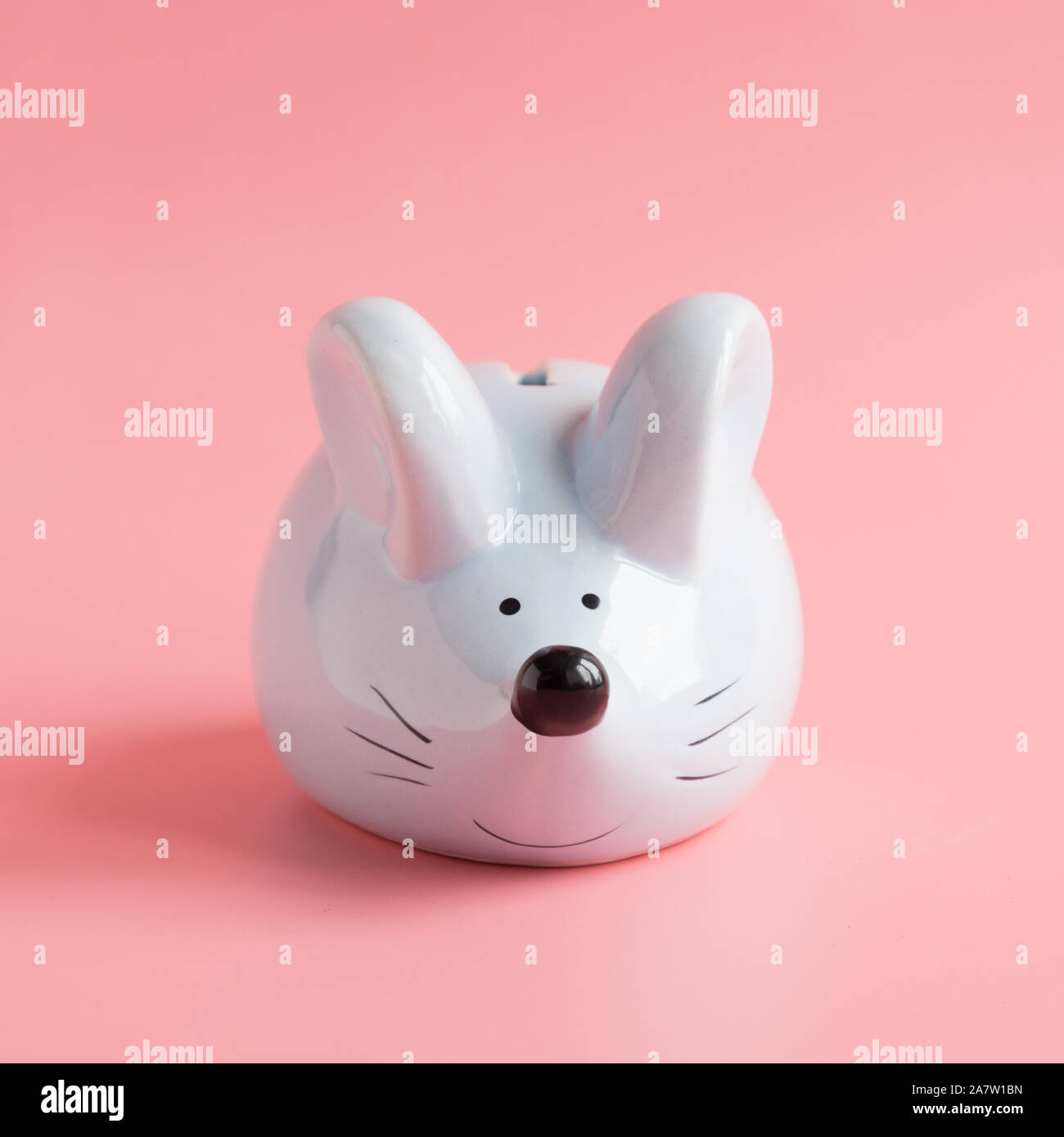Chinese Zodiac Sign Year of Rat. Little rat as money box on pink ...