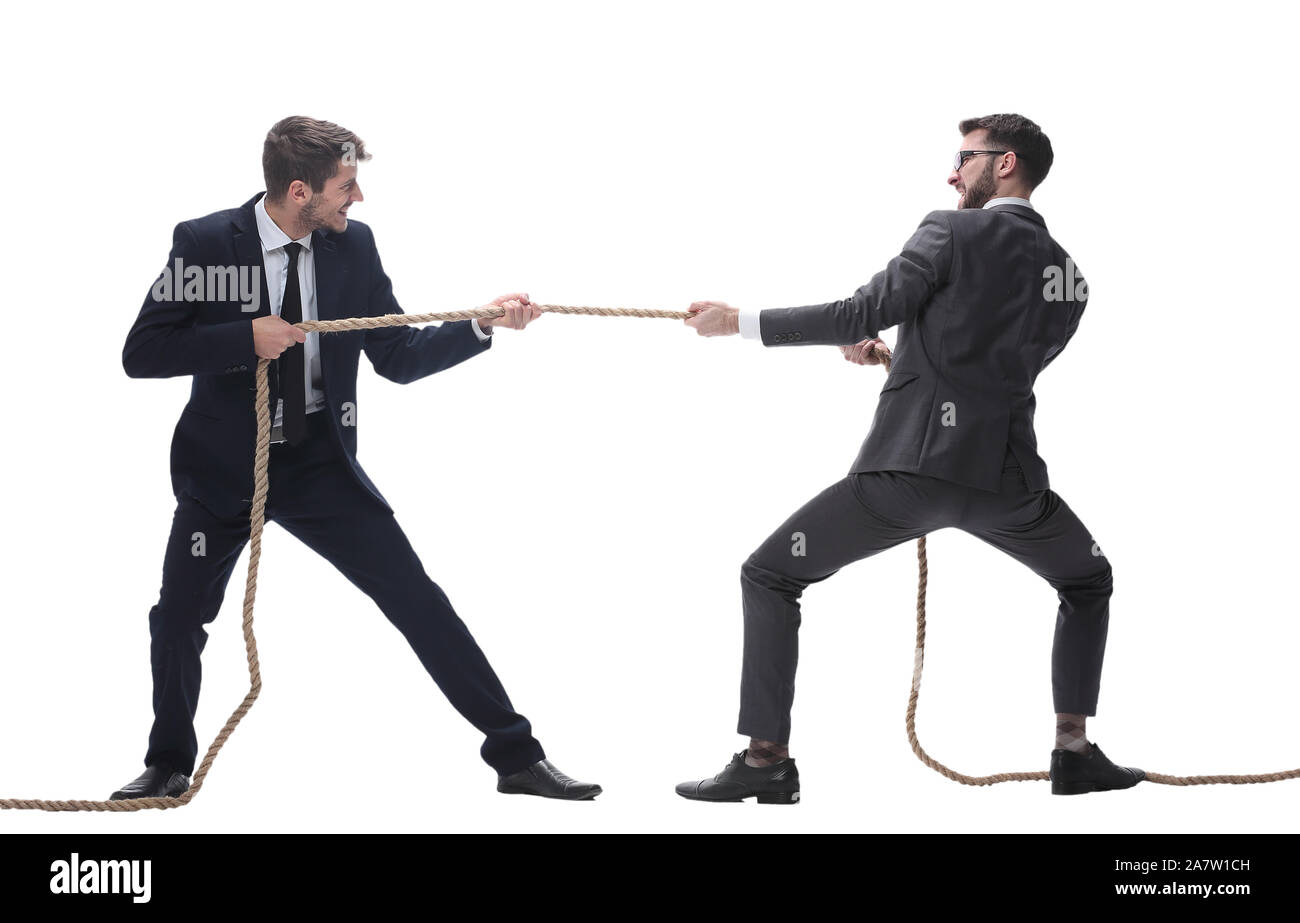 full length . two smiling businessmen pulling the rope Stock Photo - Alamy