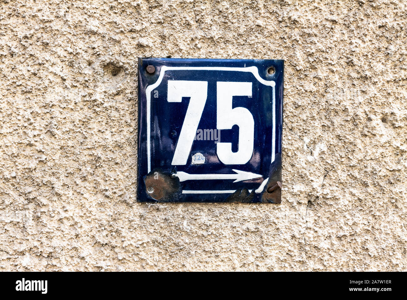 Street number sign on the wall Stock Photo - Alamy