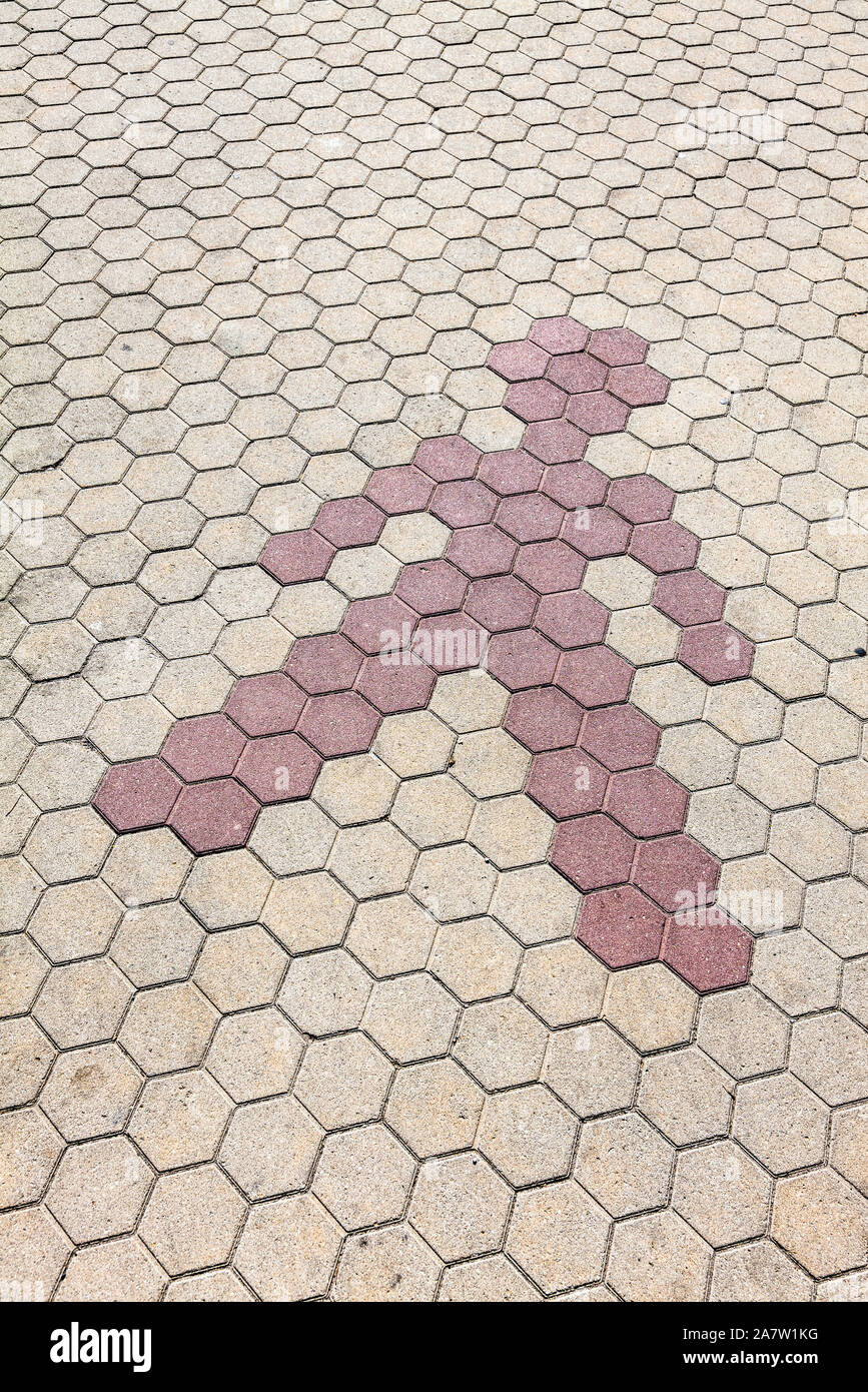 red pedestrian symbol on walkaway Stock Photo - Alamy