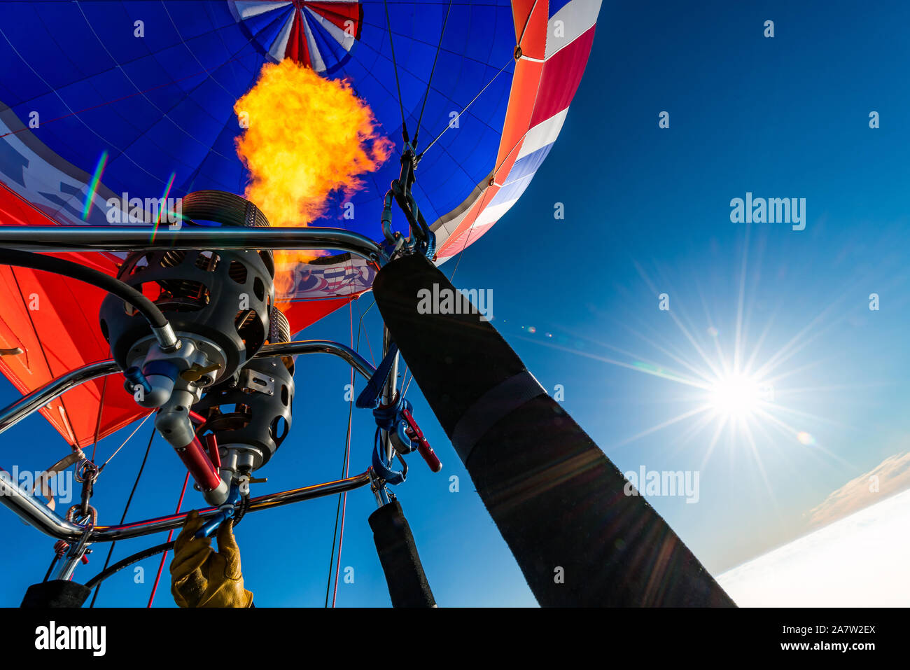 Colorful inflated hot air balloon, burning, fire Stock Photo - Alamy