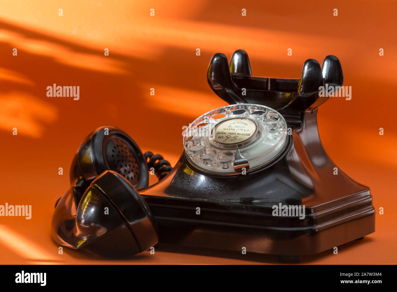 view of an old retro telephone, black, classic, wheel or disc, placed ...