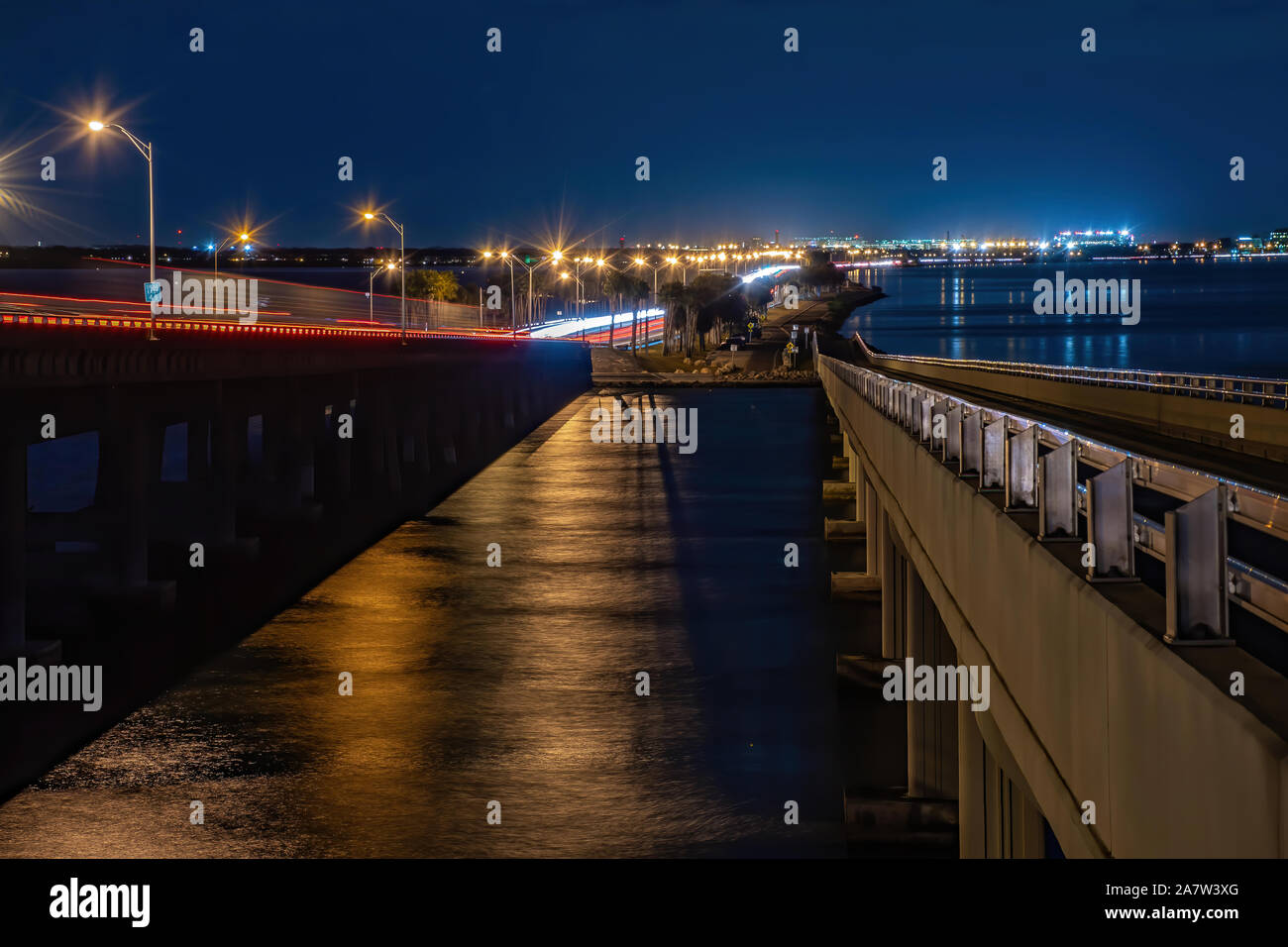 Tampa Bay at night with cars passing and city lights Stock Photo - Alamy