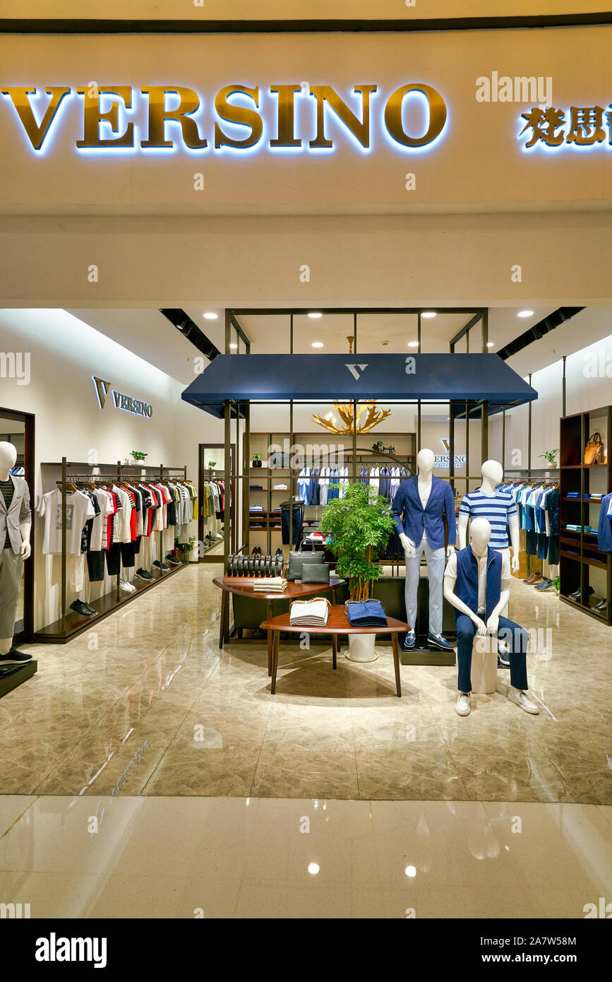 SHENZHEN, CHINA - CIRCA APRIL, 2019: clothes on display at Versino ...