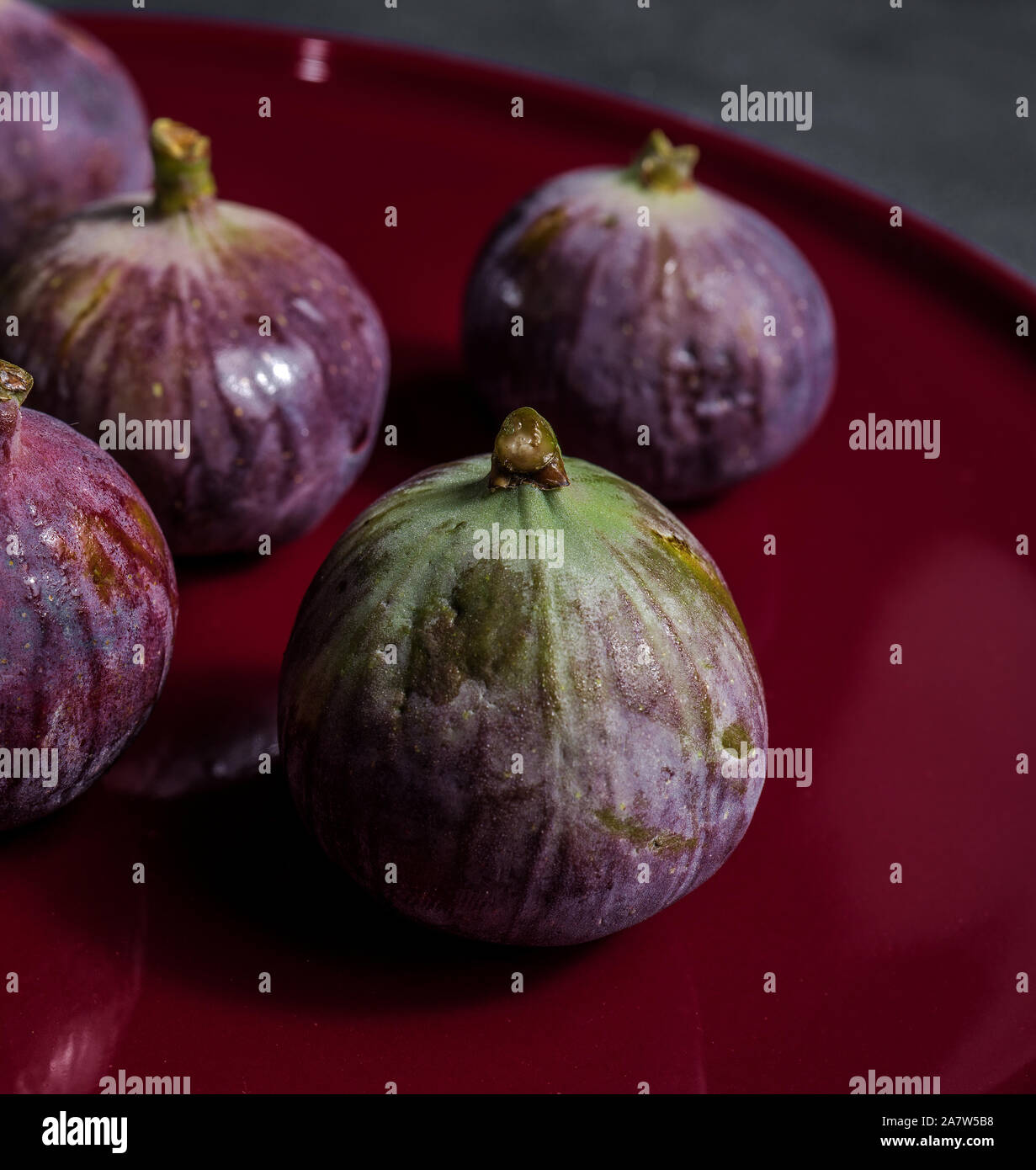 fresh figs close-up on black background. dark moody photo Stock Photo ...