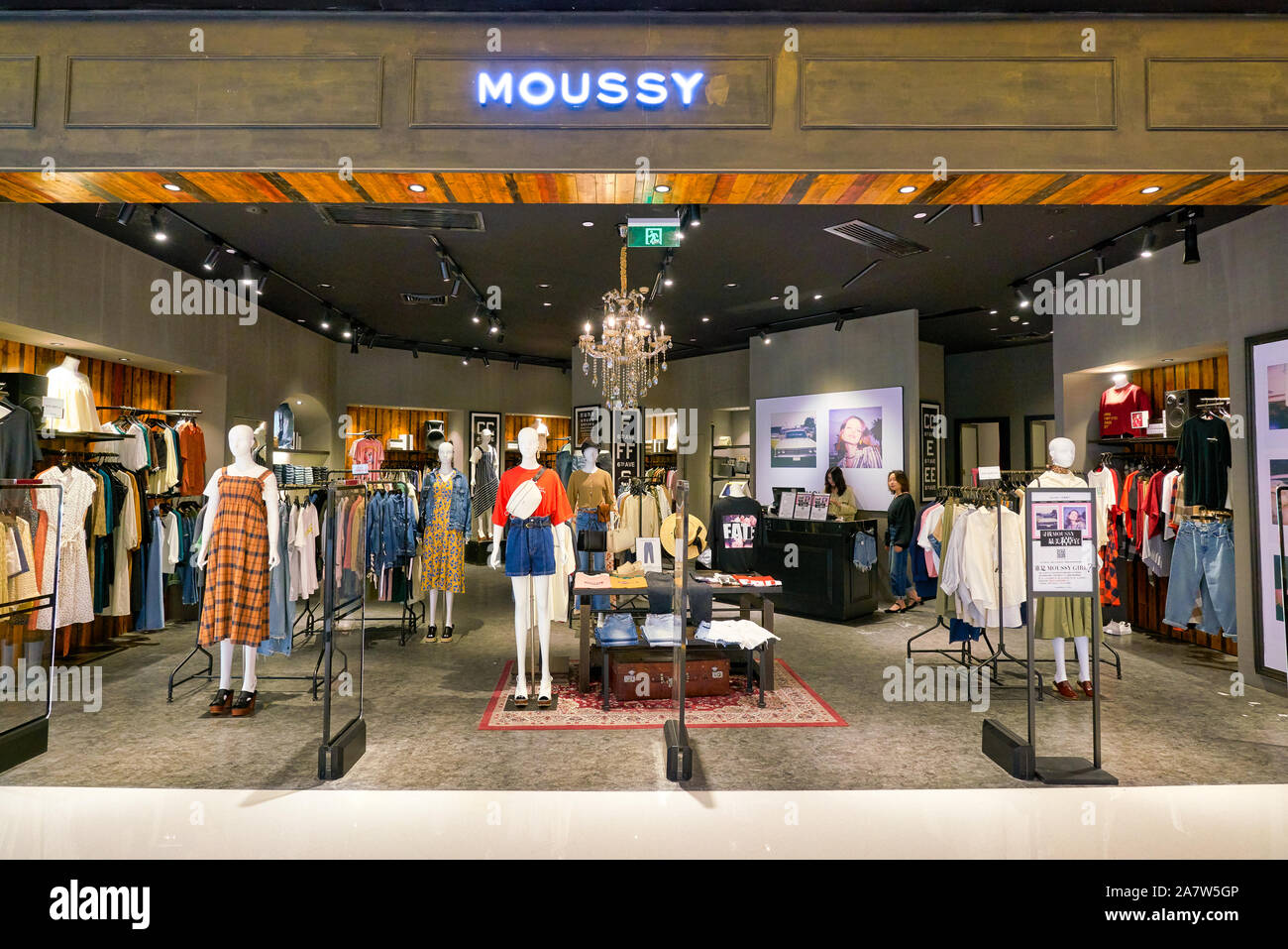 SHENZHEN, CHINA - CIRCA APRIL, 2019: clothes on display at Moussy retail store in Shenzhen Stock ...