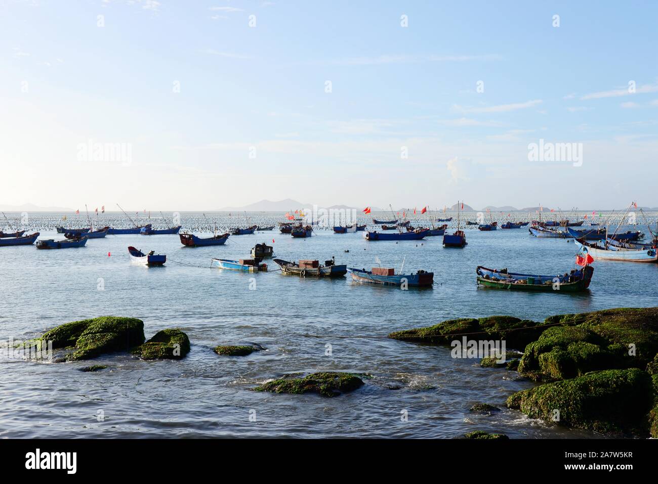 Fishing boats float around Goqi Island, the center of China's largest ...