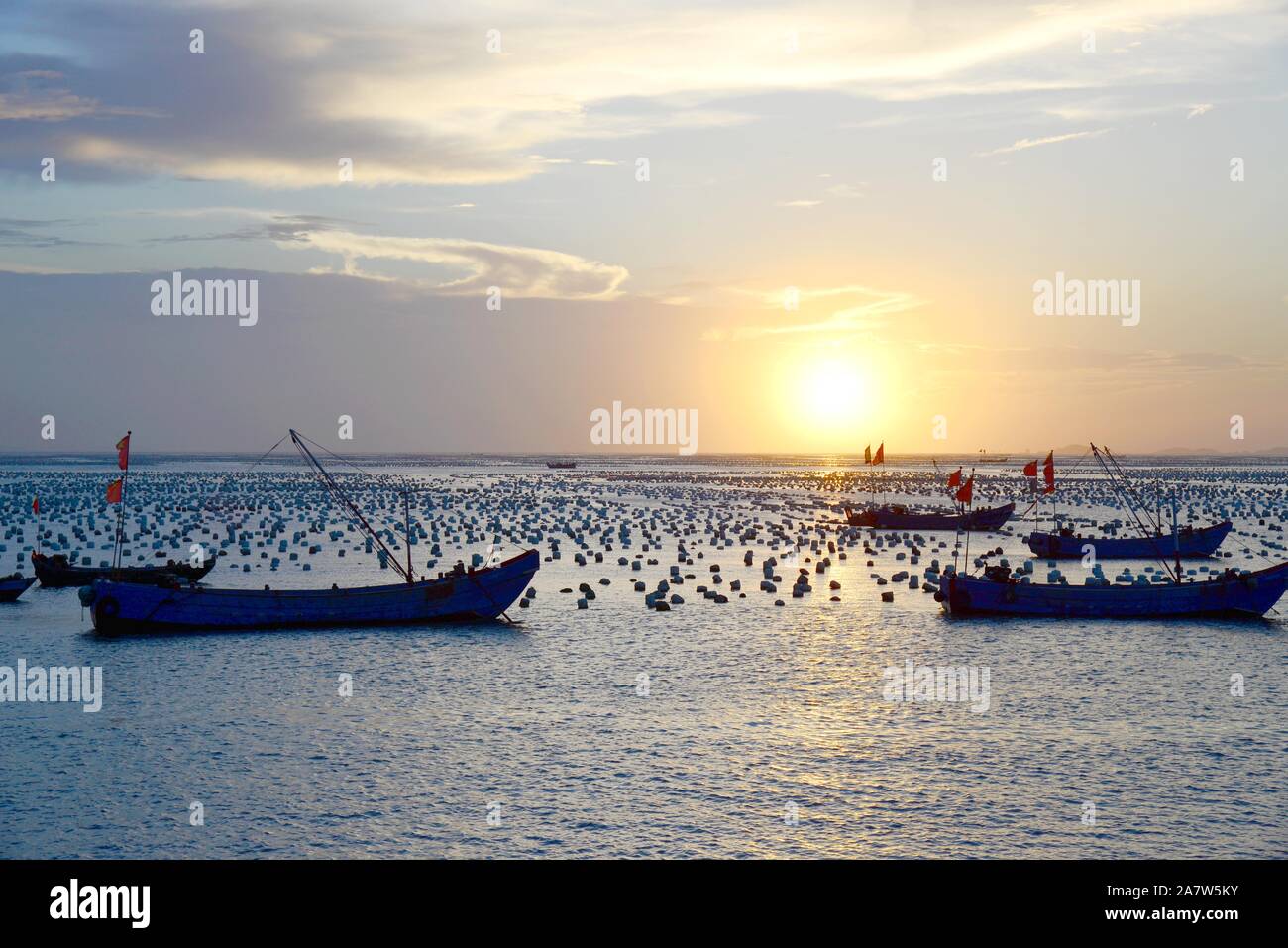 Fishing boats float around Goqi Island, the center of China's largest ...