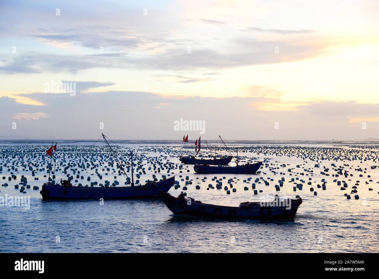 Fishing boats float around Goqi Island, the center of China's largest ...