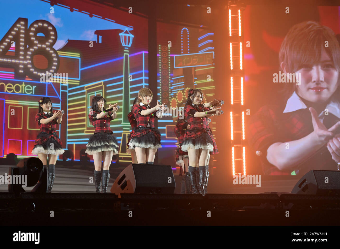 Members of Japanese idol girl group AKB48 and its international sister groups perform during the ...