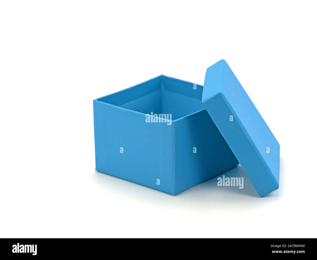 Blue empty cardboard box in front of white background Stock Photo - Alamy