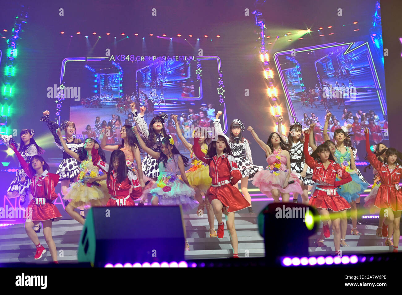 Members of Japanese idol girl group AKB48 and its international sister groups perform during the ...