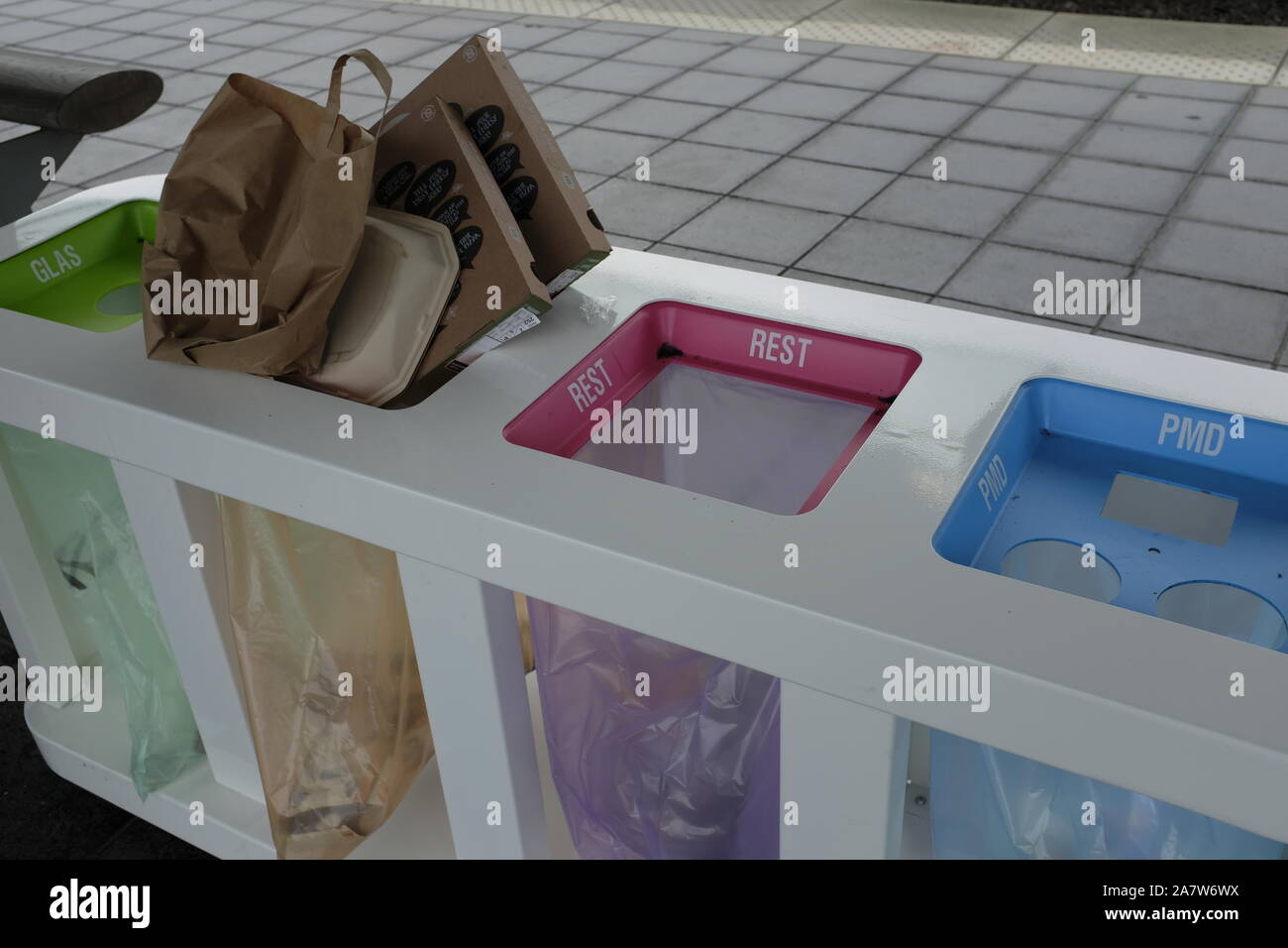 recycle bin in a belgium train station Stock Photo - Alamy