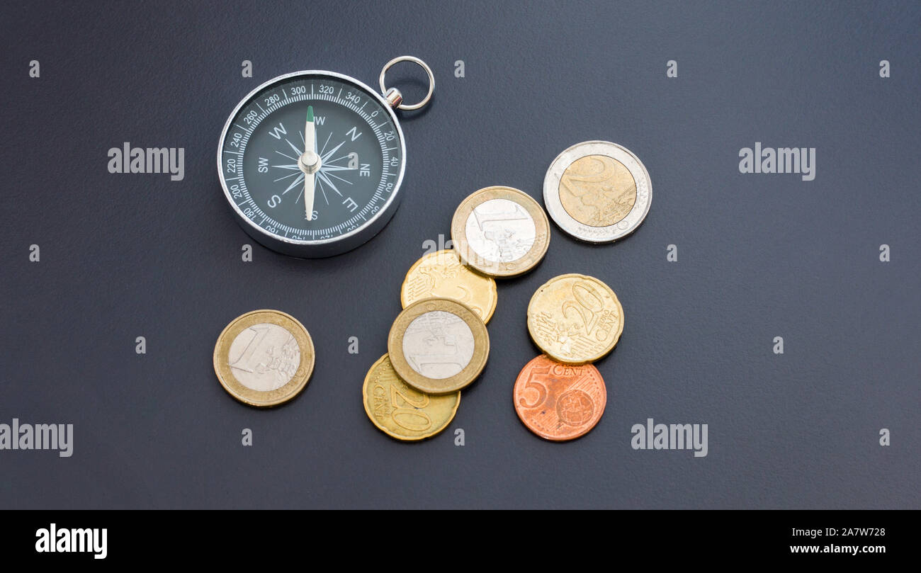 Closeup of a mans hand holding a compass in his hand. Concept for ...