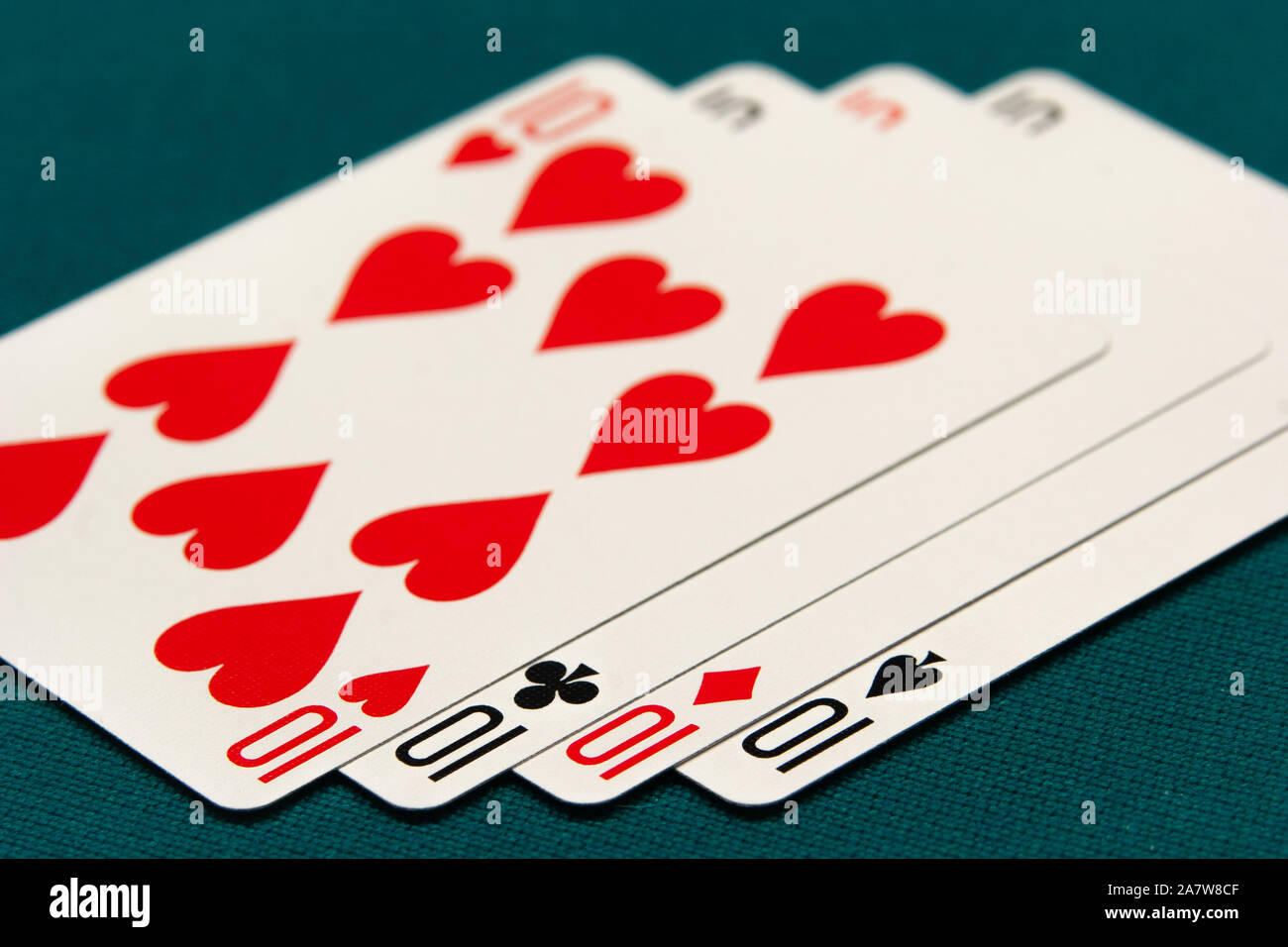 combination of four different play cards Stock Photo - Alamy