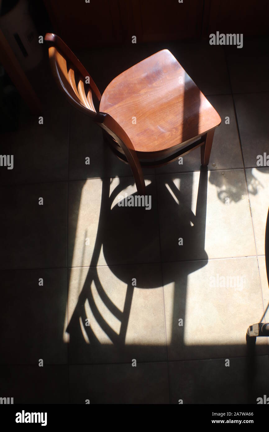 Chair in Light Stock Photo - Alamy