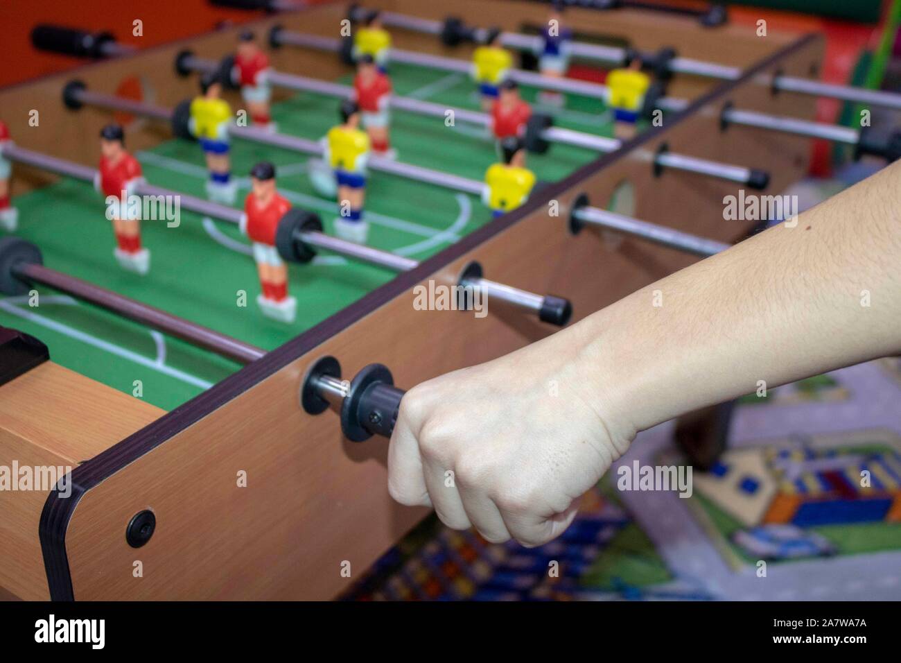 Hand and foosball table hi-res stock photography and images - Alamy