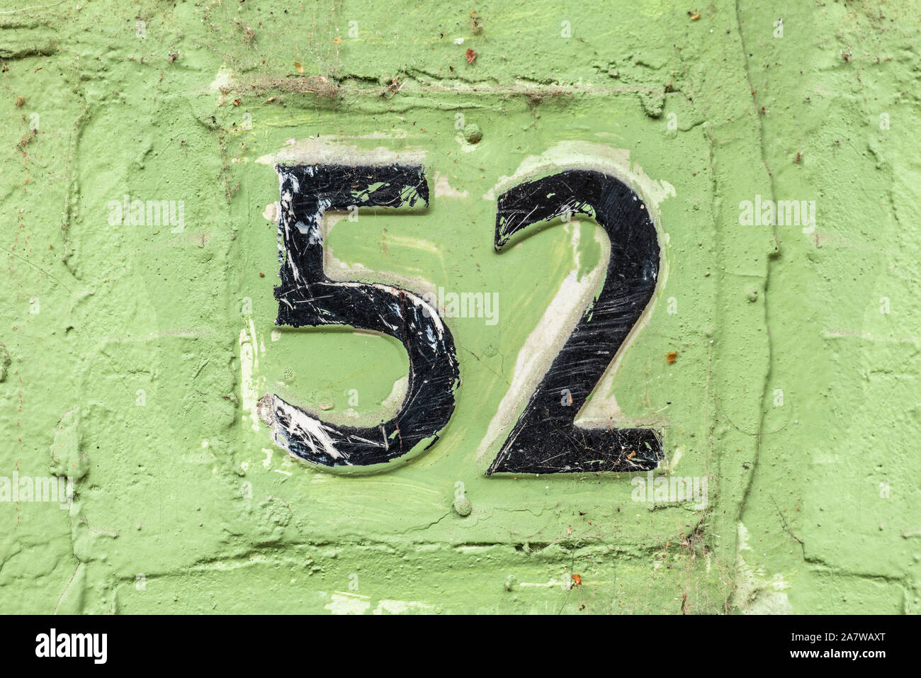 Street number sign on the wall Stock Photo - Alamy