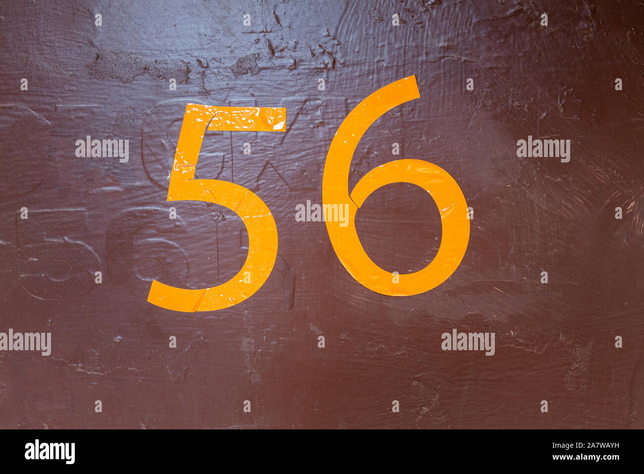 Street number sign on the wall Stock Photo - Alamy