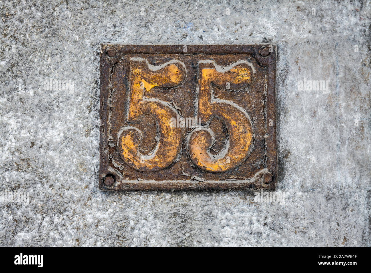 Street number sign on the wall Stock Photo - Alamy