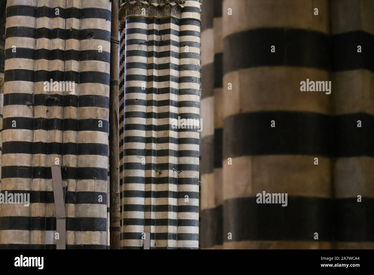 Details of a striped black and white marble column of the Siena ...