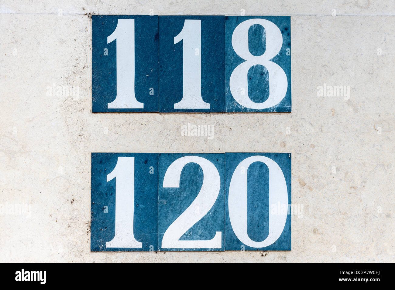 Street number sign on the wall Stock Photo - Alamy