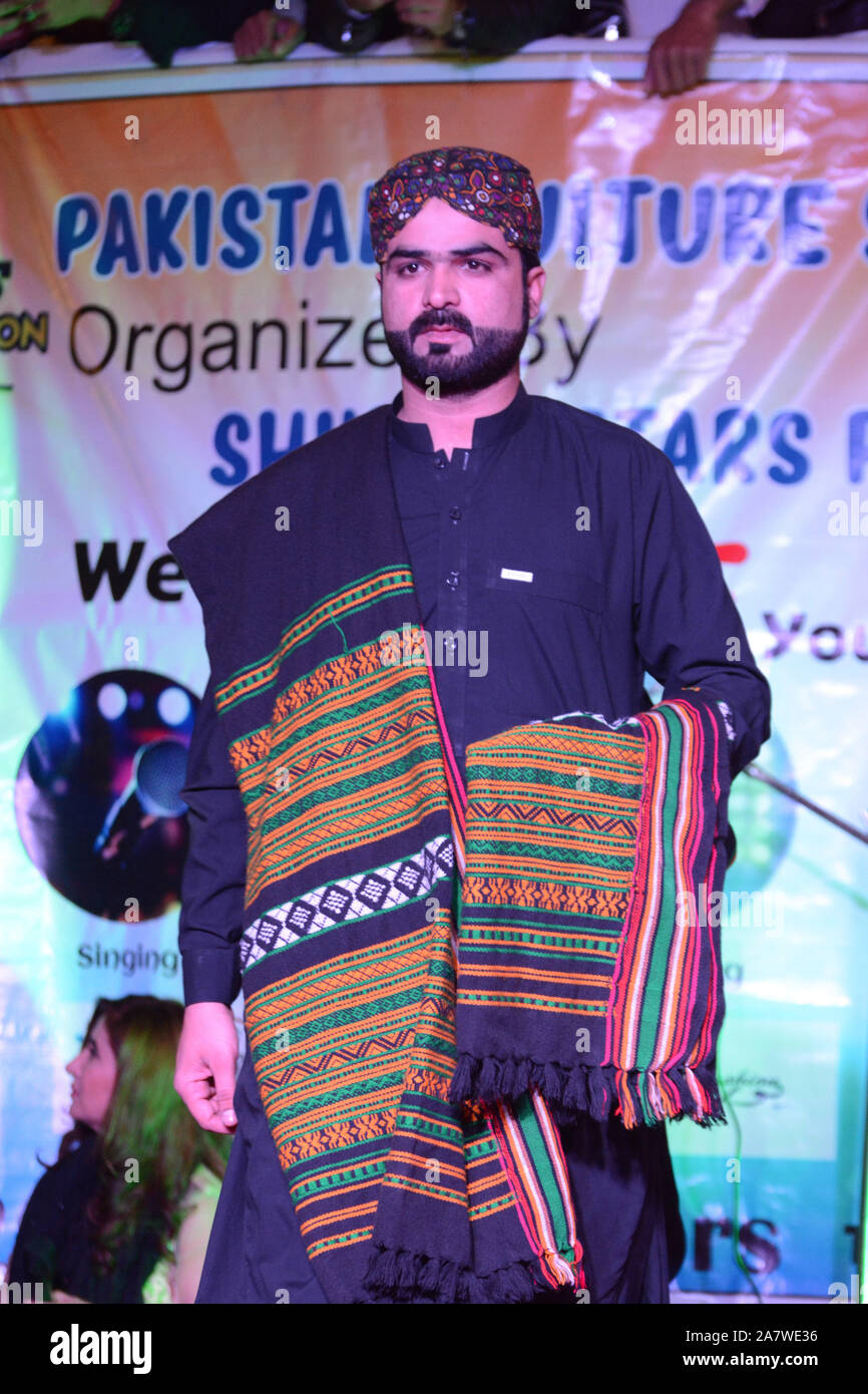 QUETTA, PAKISTAN. Nov 04-2019: A young model walking on ramp during ...