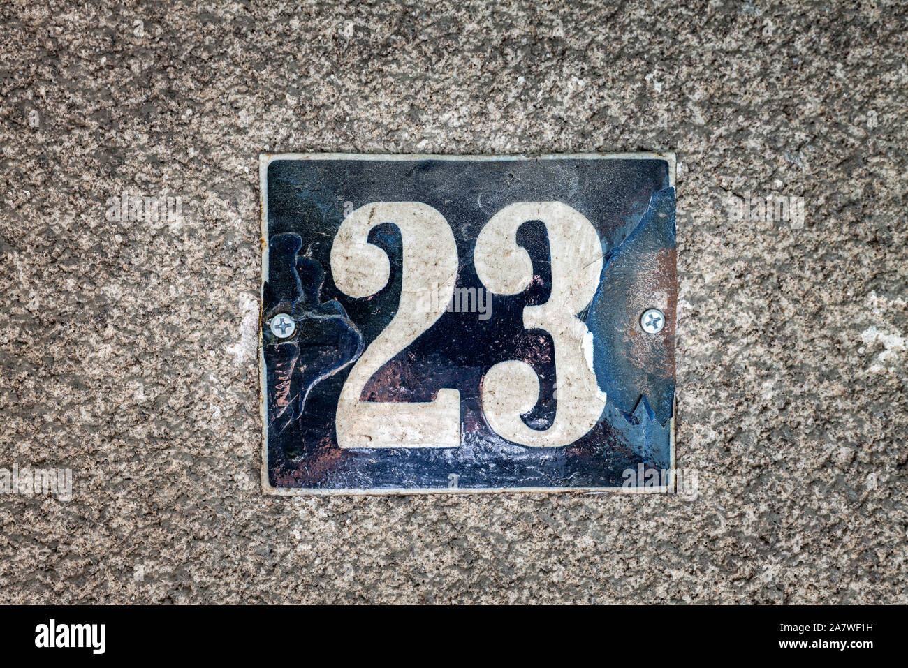 Street number sign on the wall Stock Photo - Alamy