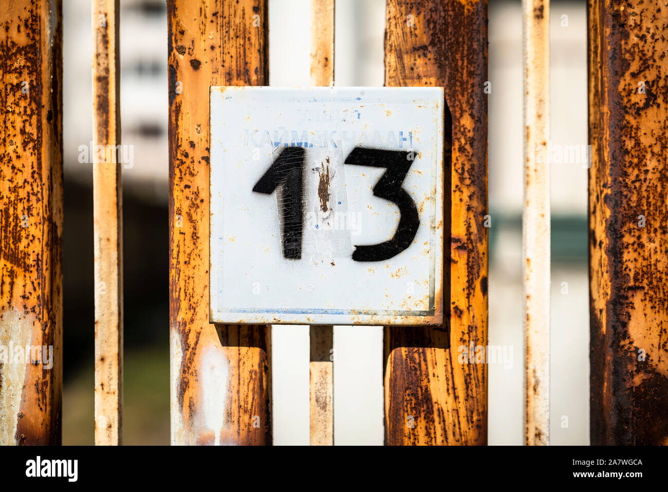 Street number sign on the wall Stock Photo - Alamy