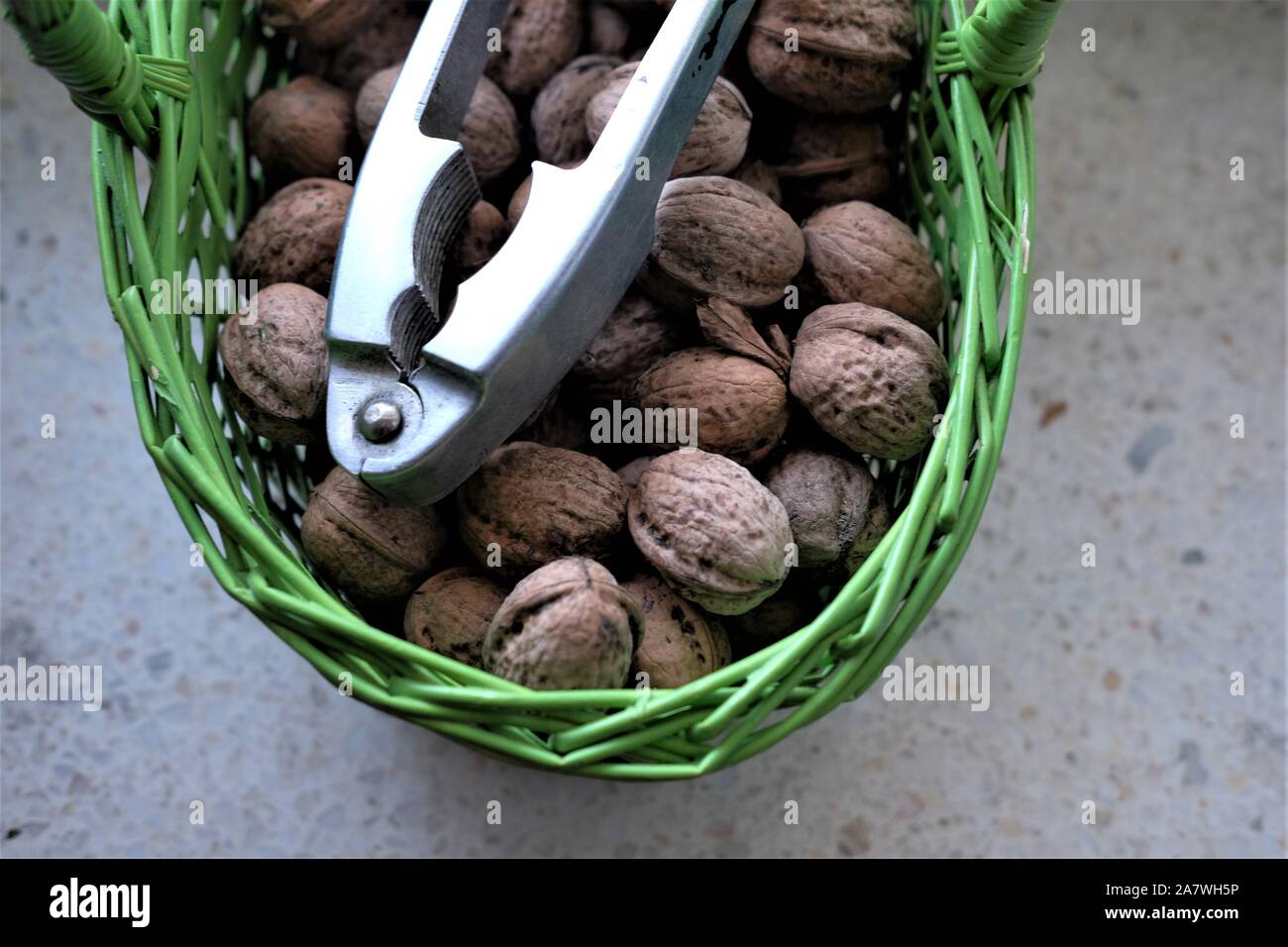 Walnuts with nutcracker hi-res stock photography and images - Alamy