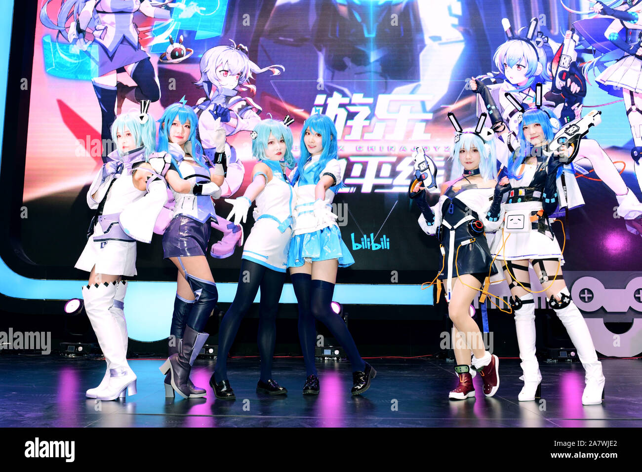 Chinese showgirls dressed in cosplay costumes pose during the 17th ...