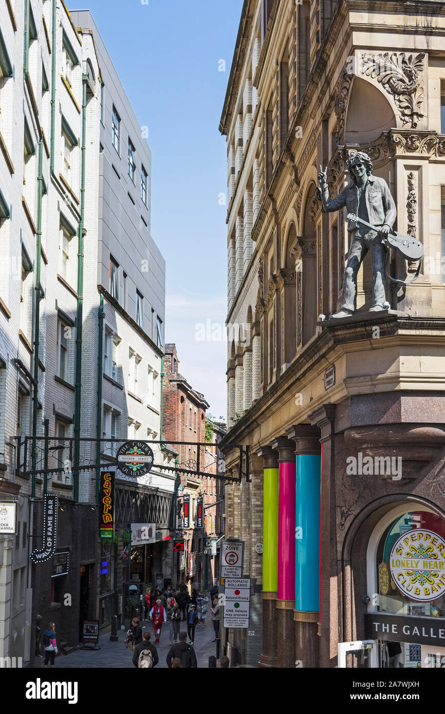 A John Lennon statue looks down on the Cavern Quarter, Liverpool, UK ...