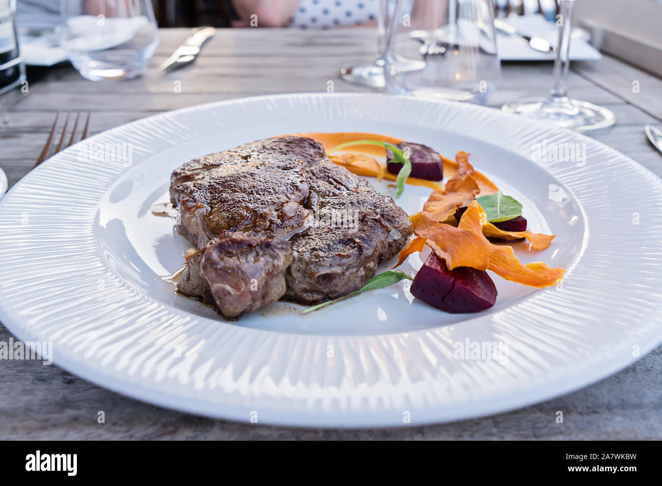 Cooked medium roasted fresh steak by angus beef with vegetables on ...