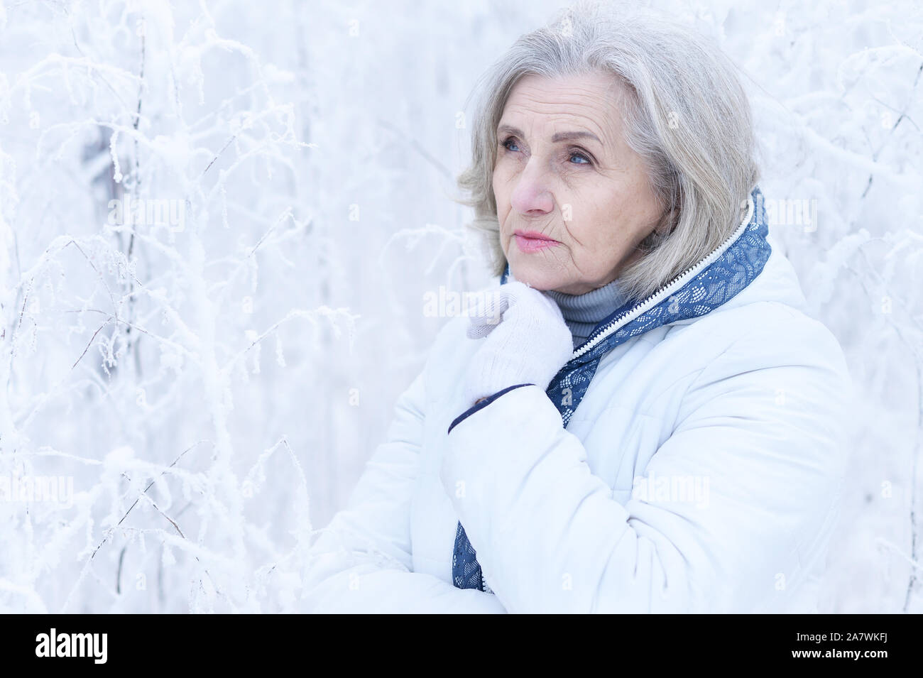 Sad woman posing in winter hi-res stock photography and images - Alamy