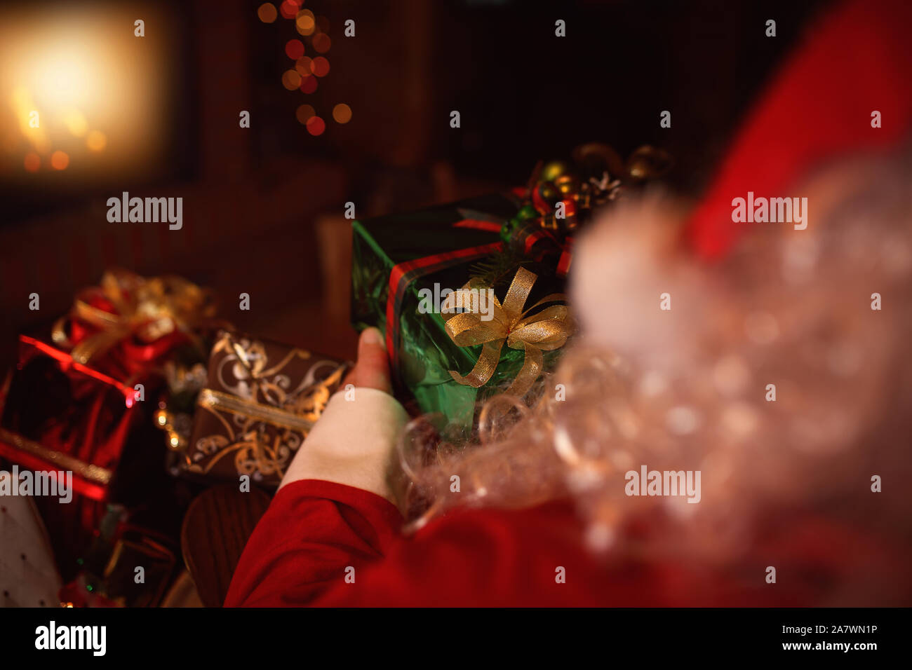 Santa claus in front fireplace hi-res stock photography and images - Alamy