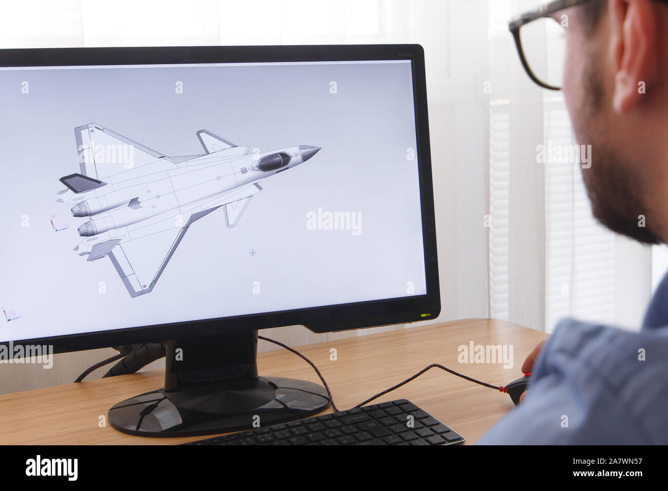 Engineer, Constructor, Designer in Glasses Working on a Personal ...