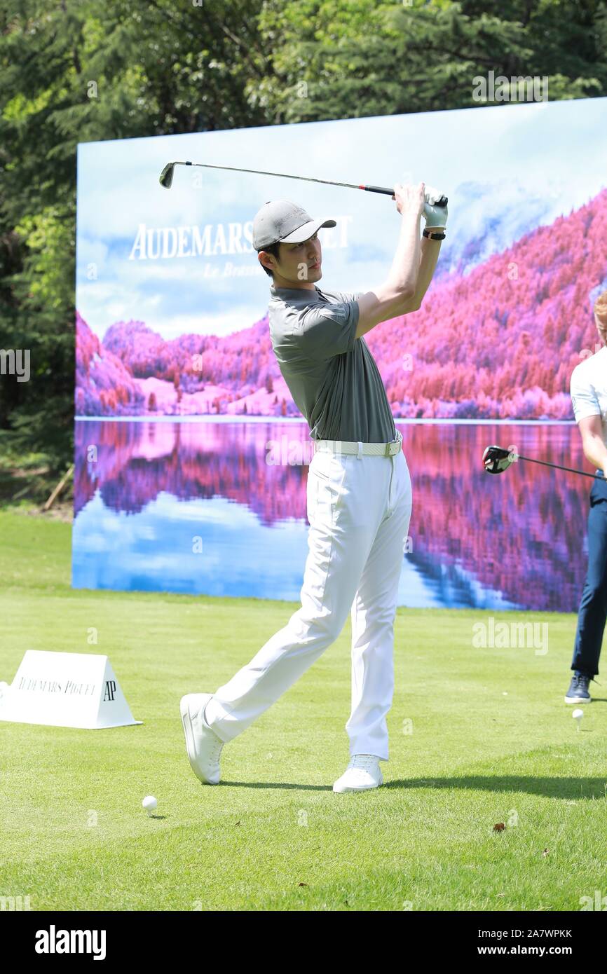 Hong Kong actor Wallace Chung Hon-leung plays golf at a promotional ...